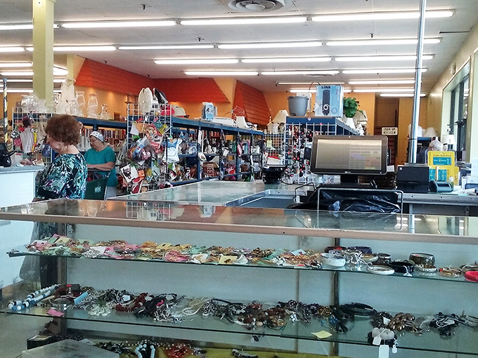 The checkout counter's jewelry display showcases decades of accessorizing trends &ndash; from statement pieces that scream 1980s to delicate chains waiting for their comeback.