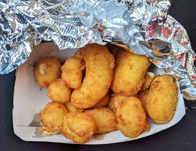 These aren't just cheese curds; they're little nuggets of joy that somehow improve your day with each crunchy, gooey bite.