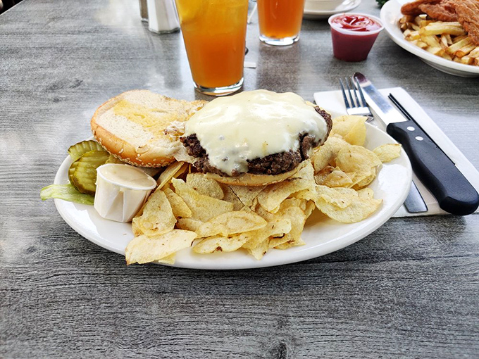 This isn't just a cheeseburger&mdash;it's a statement of purpose. The melted cheese blanket tucks in a patty that's clearly lived its best life.