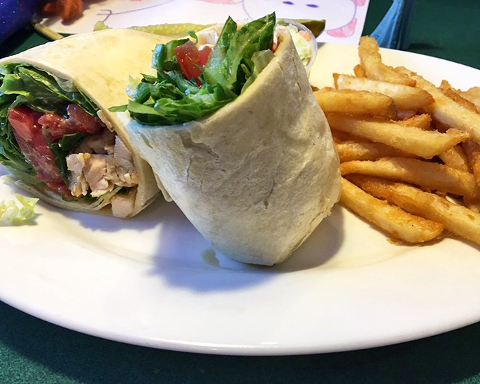 The Caesar salad got tired of bowls and upgraded to portable housing. This wrap delivers crisp greens and grilled chicken in perfect harmony.