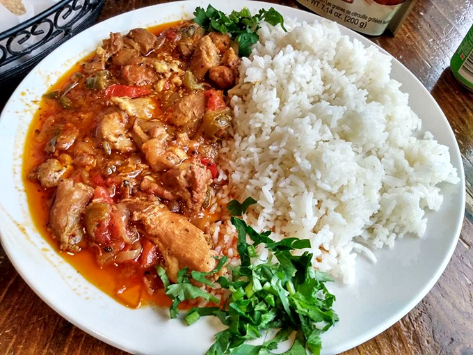 Chicken that's clearly been introduced to spices on a first-name basis. Served with rice so fluffy it might float away if not anchored by that magnificent sauce.