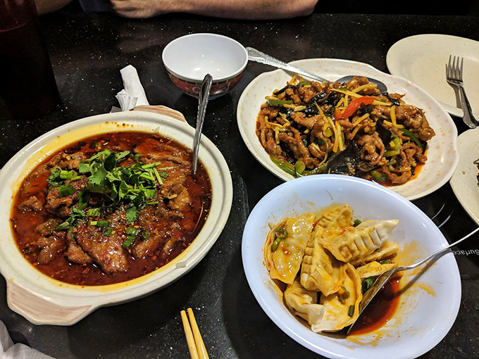 A trio of dishes that proves the point: Chinese food isn't a monolith but a symphony of textures, colors, and flavors.