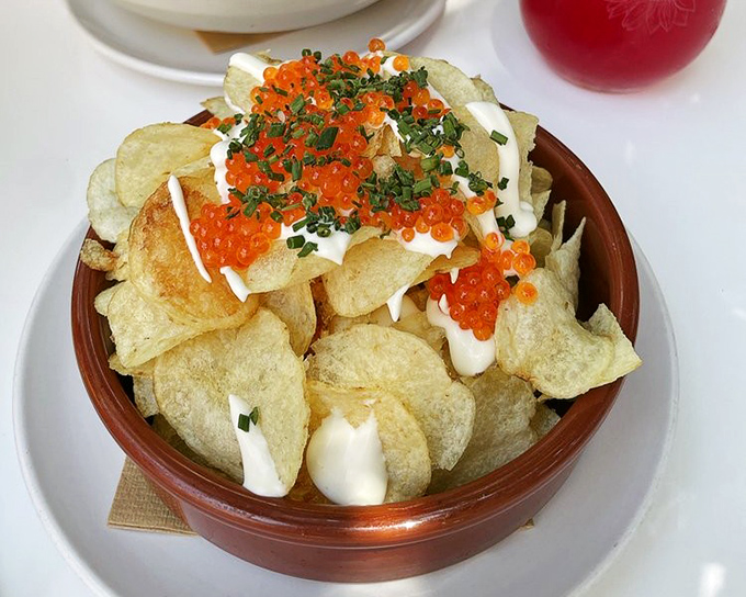 Chips and "caviar" that would make your grandmother clutch her pearls and your taste buds stand at attention. Fancy meets fun.