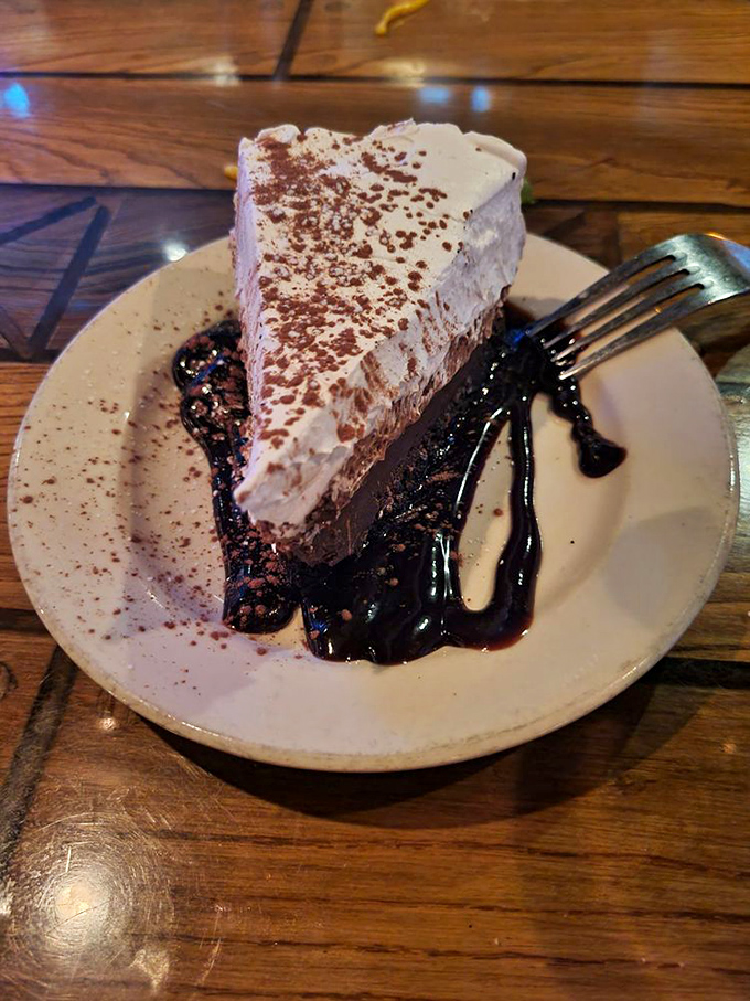 Chocolate mousse pie with a cloud of whipped cream&mdash;the kind of dessert that makes you suddenly discover room in your stomach you didn't know existed.