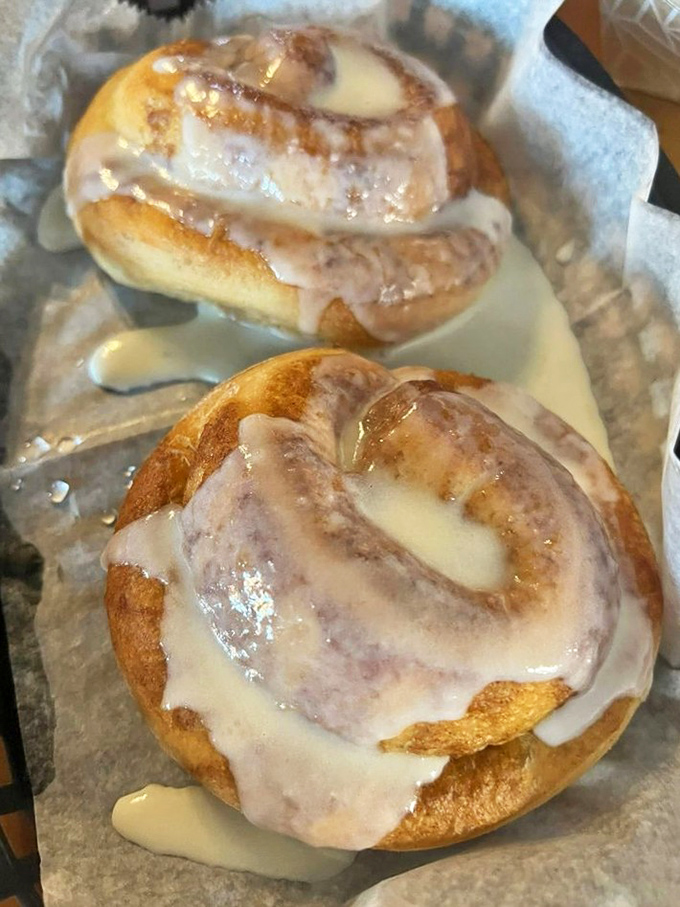 These cinnamon rolls aren't just dessert; they're edible therapy. The icing doesn't politely drizzle—it cascades with reckless, glorious abandon.