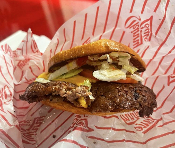 The Classic Burger proves that sometimes tradition trumps innovation. Fresh veggies provide the perfect crunch against that perfectly seasoned patty.