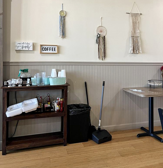 A dedicated coffee station that takes the morning brew seriously, complete with charming rustic wall decorations.