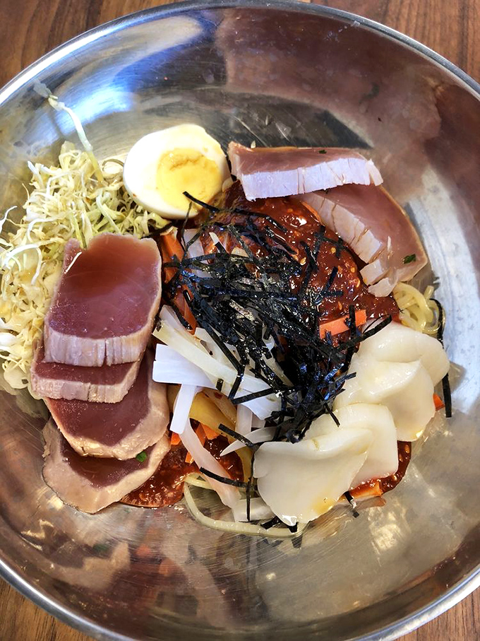 Cold noodles meet bold flavors in a refreshing bowl that proves comfort food transcends temperature preferences. 