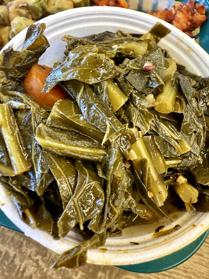 Collard greens that have clearly been hanging out with smoked pork. These aren't your sad cafeteria vegetables&mdash;they're the side dish equivalent of a Southern hug.