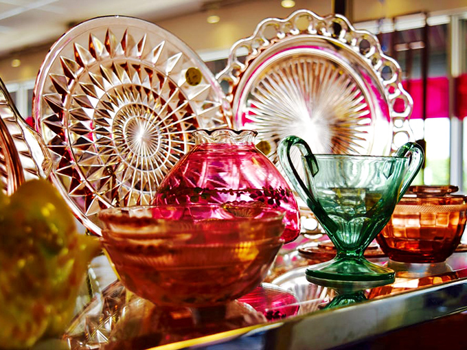 Depression glass and vintage serveware catch the light in a kaleidoscope of colors&mdash;functional art that costs less than your morning latte.