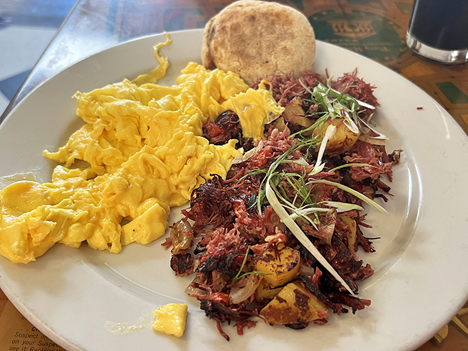 Scrambled eggs so fluffy they might float away if not anchored by that glorious pile of corned beef hash. A breakfast worth getting out of bed for.