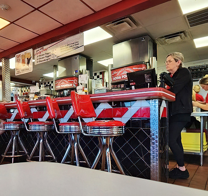 Counter seating for those who like their dinner with a side of kitchen choreography.