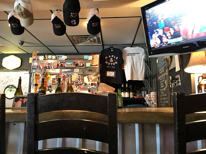 The counter where magic happens. Those Maple & Motor t-shirts aren't just merch&mdash;they're badges of honor for true believers.