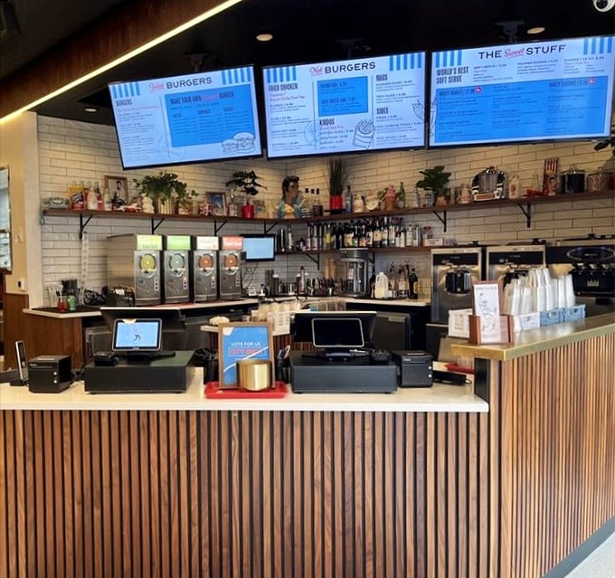 Where burger magic happens&mdash;a counter that separates mere mortals from the wizards who transform simple ingredients into handheld joy.