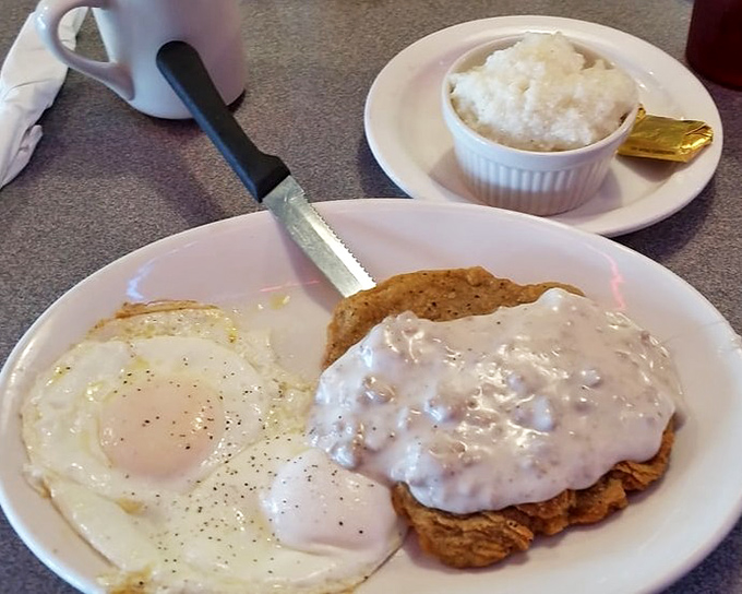 Country fried steak smothered in gravy like a delicious blanket on a cold morning.