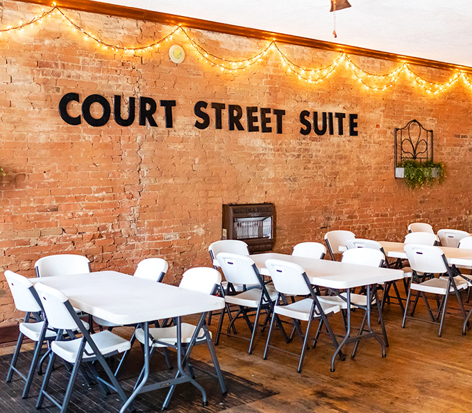 The Court Street Suite's exposed brick and string lights create the perfect backdrop for everything from community meetings to celebration dinners.