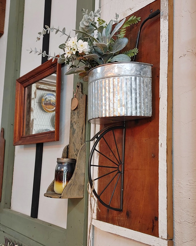 Who knew galvanized metal could look so elegant? This wall display proves that agricultural materials make the most charming home accents.