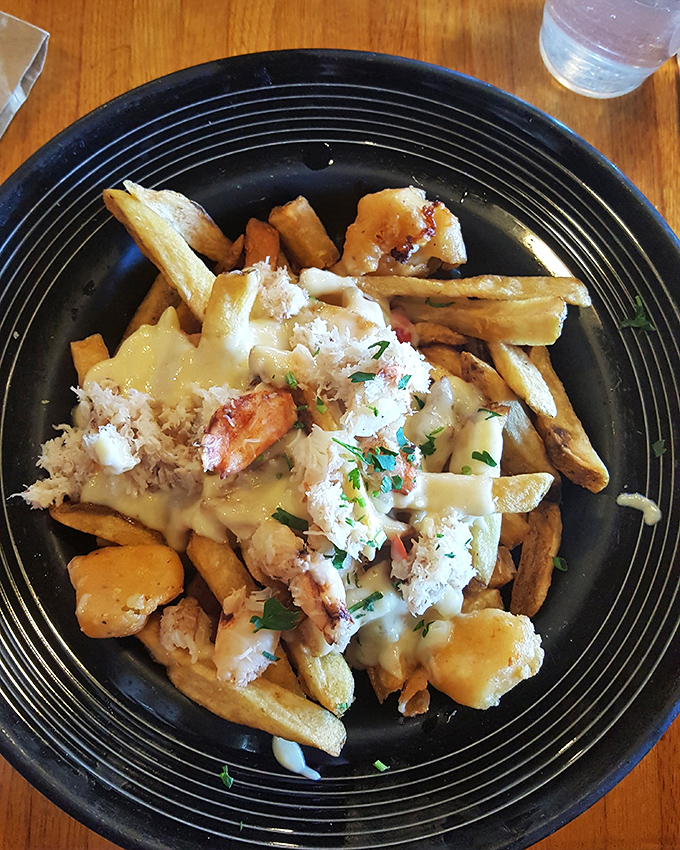 Crab poutine fries&mdash;because sometimes the most beautiful relationships are the ones nobody saw coming. Canada, meet California. You're welcome.