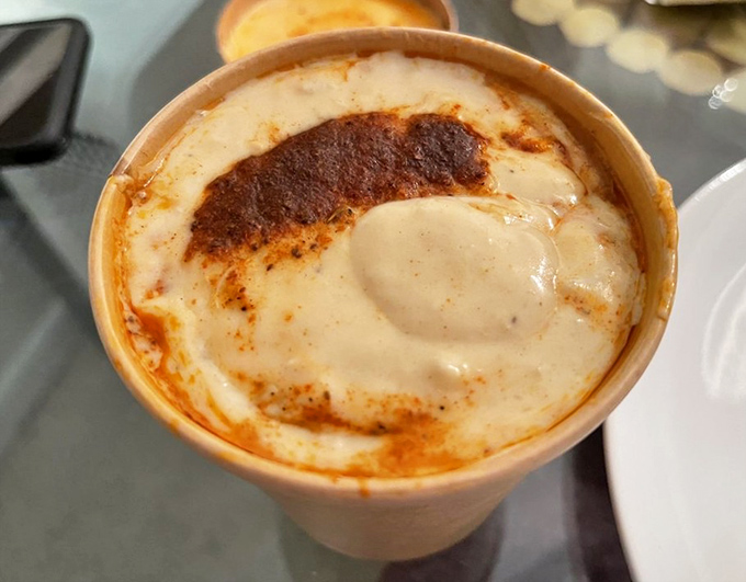 Cream of crab soup so rich it could apply for its own tax bracket. Velvety, decadent, and worth every calorie-laden spoonful.