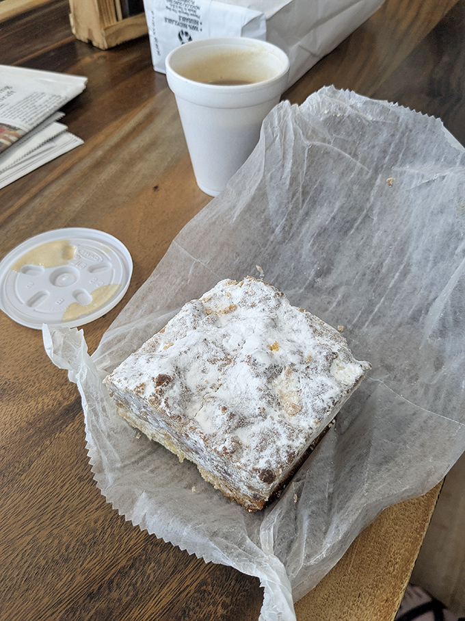 The powdered sugar-dusted crumb cake isn't trying to be Instagram famous&mdash;it's too busy being delicious in its simple, old-school bakery perfection.