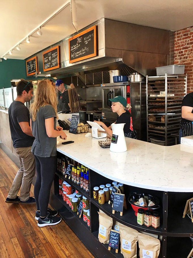 The ordering counter&mdash;where decisions are made, anticipation builds, and the aroma of fried chicken makes patience nearly impossible.