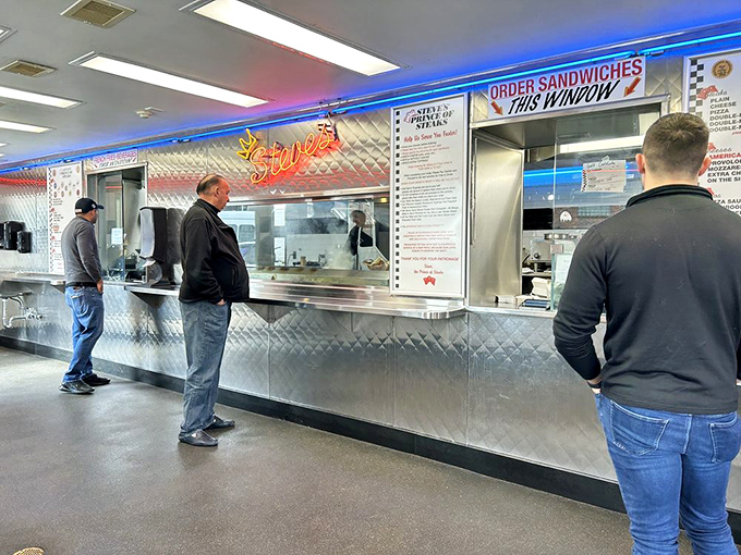 The line forms with purpose—these customers aren't just waiting, they're participating in a Philadelphia ritual as sacred as the Liberty Bell.