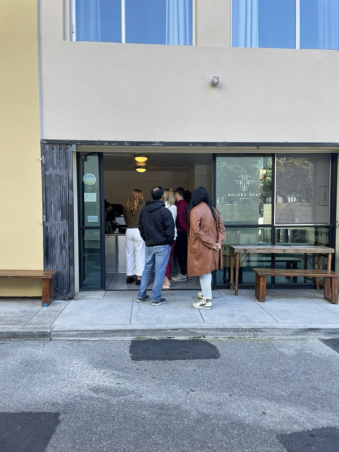 The universal language of great coffee: waiting in line. When people willingly queue outside a tiny storefront, you know what awaits inside is worth every minute.