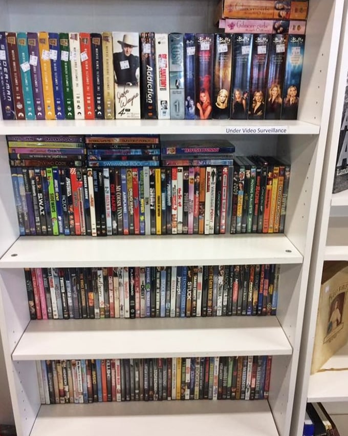 DVD shelves offer a nostalgic trip through entertainment history. Remember when we actually had to own movies instead of streaming them?