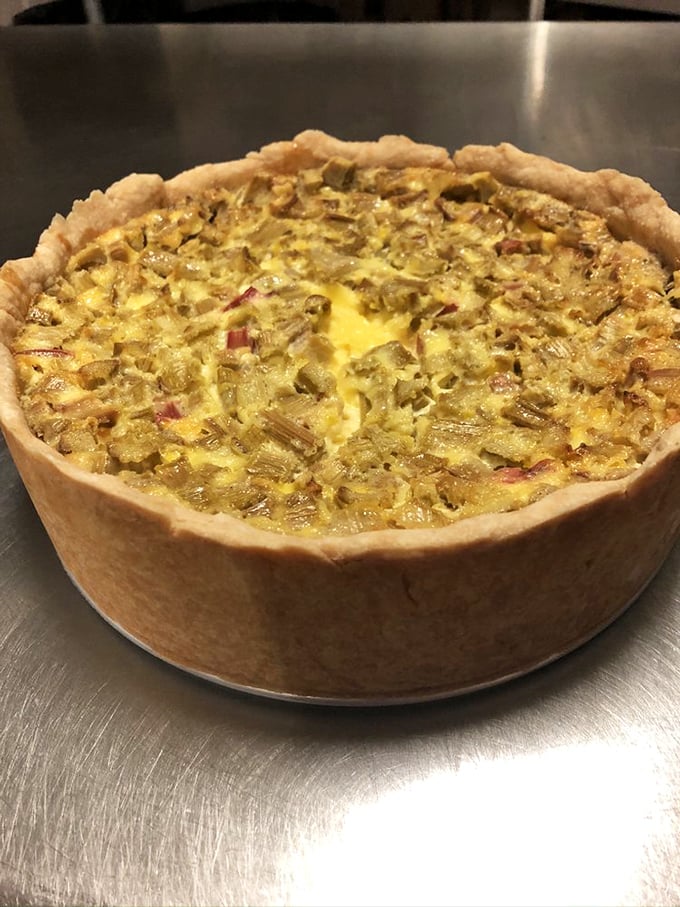 Deep dish rhubarb custard pie with a crust so perfectly flaky it deserves its own appreciation society &ndash; spring's tartness tamed by sweet, creamy custard.