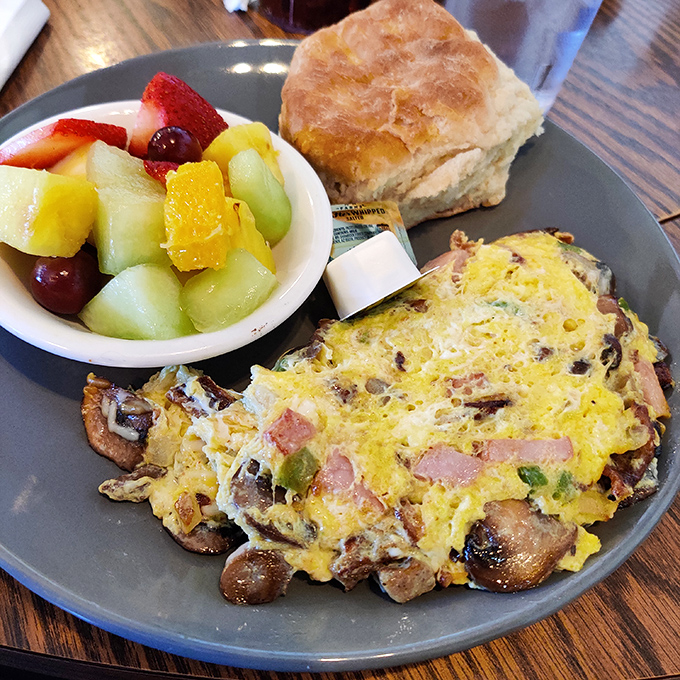 This Denver omelet with fresh fruit and a biscuit isn't just breakfast&mdash;it's morning motivation in edible form.