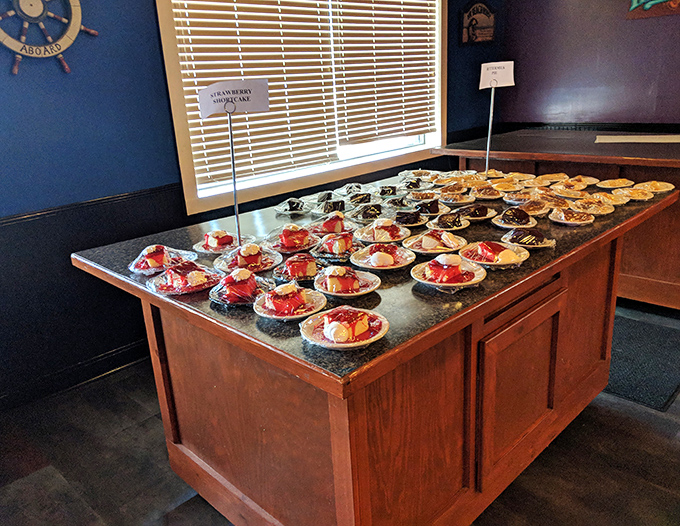 The dessert table&mdash;where diet plans go to die happily. Those strawberry shortcakes stand in formation, waiting to deliver their sweet finale.