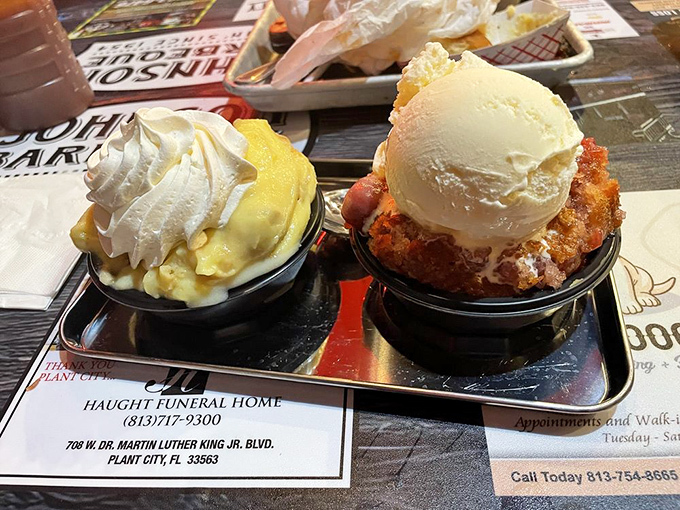 Dessert indecision has never looked so beautiful. Banana pudding with whipped cream on the left, cobbler with ice cream on the right&mdash;the Sophie's Choice of sweets.