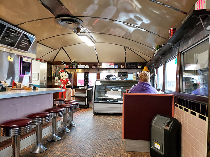 The curved ceiling and counter create the classic diner car experience&mdash;a dining room designed when conversation was still the main course.
