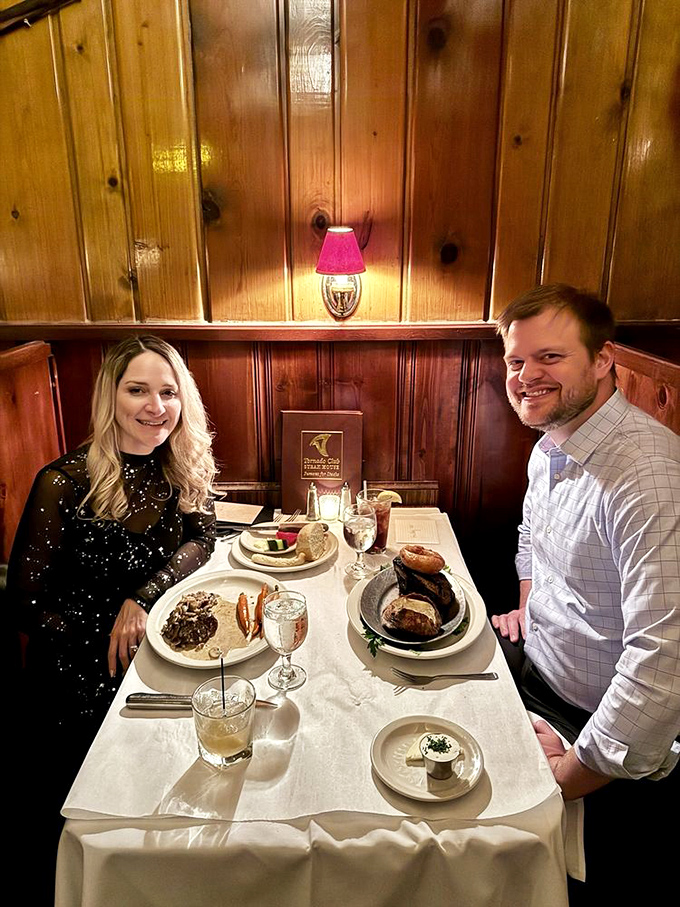 Happy diners experiencing the Wisconsin supper club tradition at its finest—where generous portions and warm hospitality create memories that outlast the meal.