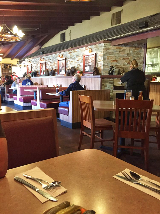 Every table tells a story of anticipation and satisfaction. Those place settings are about to witness some serious barbecue business.