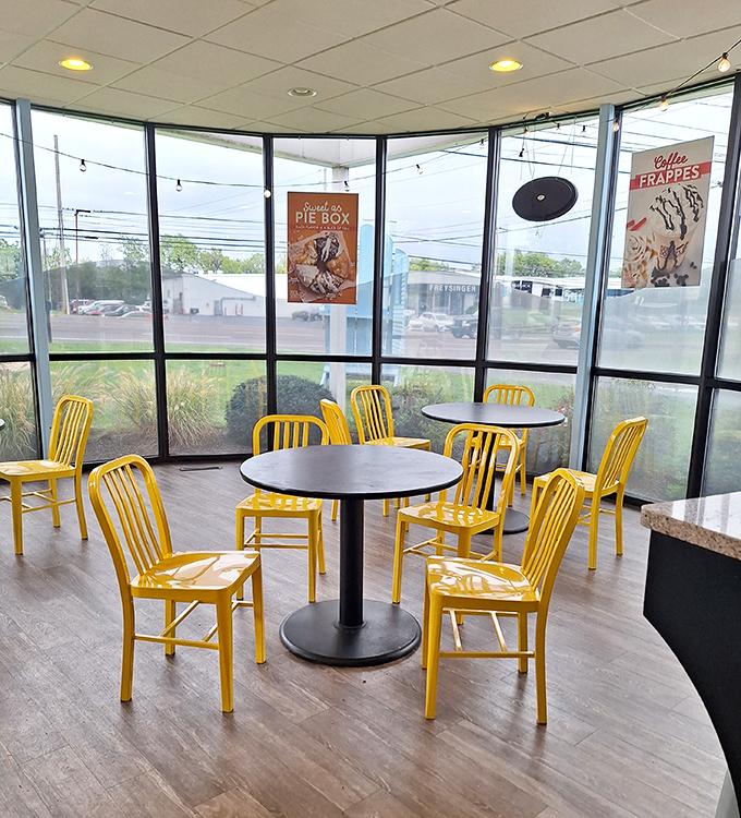 More of those signature yellow chairs bathed in natural light. The perfect spot to contemplate life's big questions, like "Should I get another donut?"