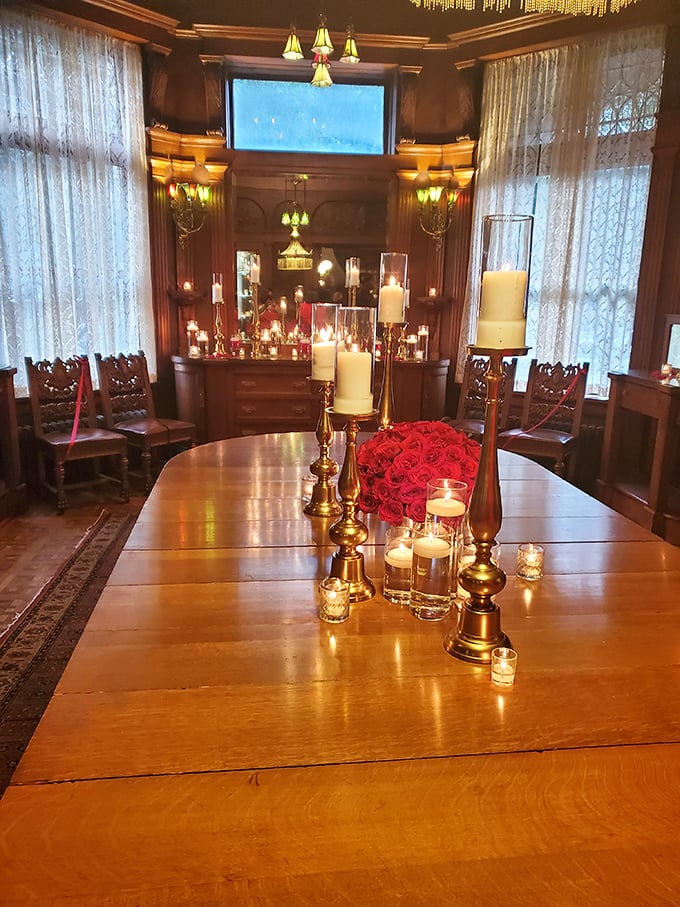 Candlelight dining fit for royalty. This elegant table setting transforms an already impressive room into something straight out of Downton Abbey.