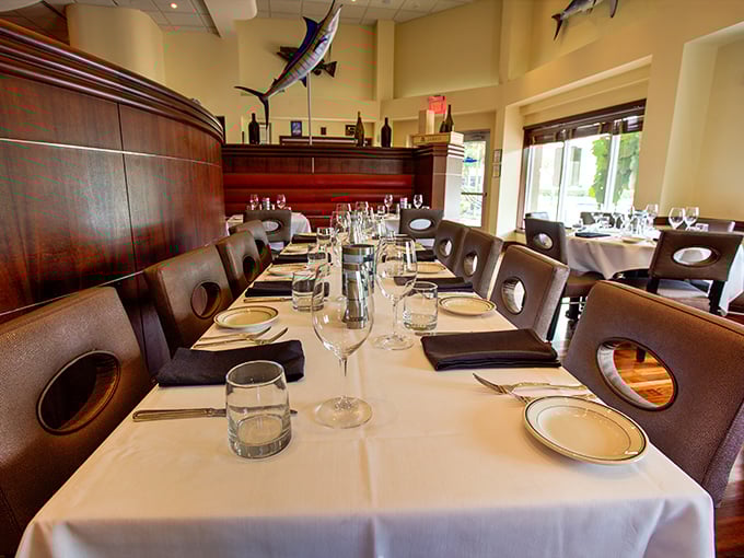 The dining room's warm wood tones and nautical touches create an atmosphere where you half-expect to toast to your transatlantic voyage.