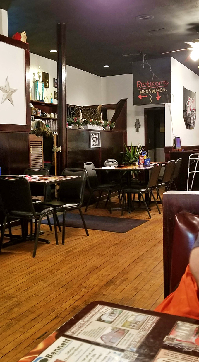 Wooden floors that have supported generations of diners. The simple, comfortable seating invites you to settle in and stay awhile.