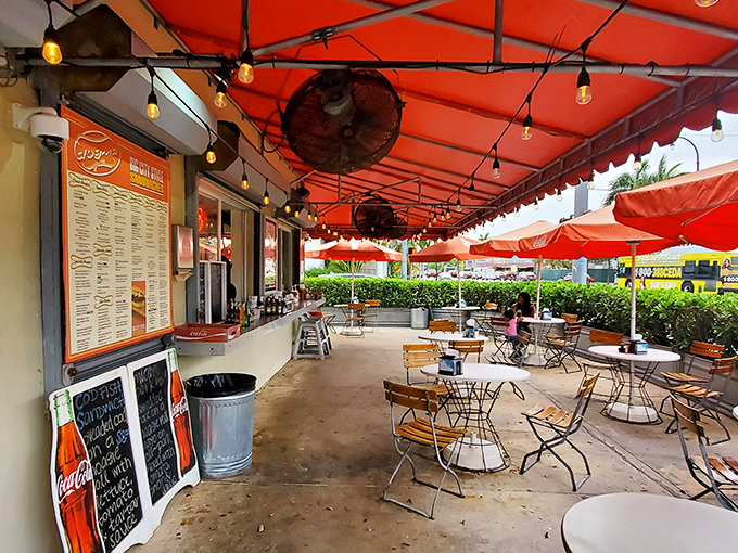 String lights and outdoor seating create the perfect atmosphere for devouring dogs and discussing life's important matters.