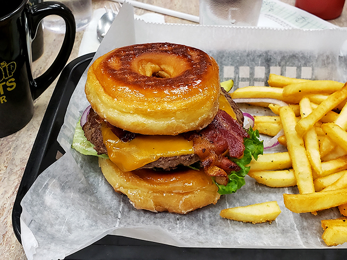 The donut burger&mdash;where breakfast and lunch stop fighting and fall in love. Your cardiologist won't approve, but your taste buds will write thank-you notes.