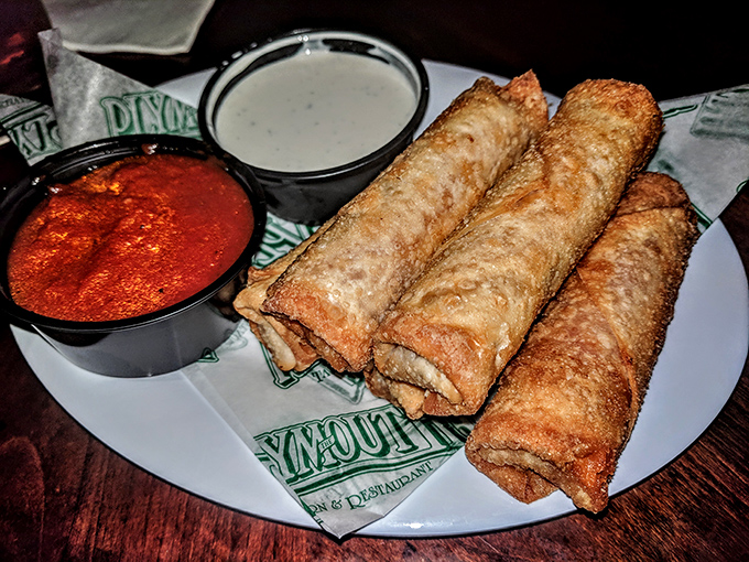 Pizza logs – the brilliant invention that asks "what if we made pizza portable?" and answers with crispy, dippable perfection.