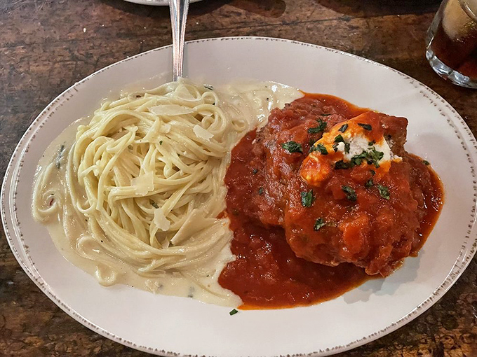 Half creamy pasta, half robust tomato sauce&mdash;a plate divided by flavor but united in its mission to make you forget all your dining manners.