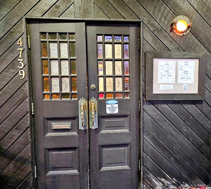 These doors have welcomed seafood lovers for generations &ndash; the nautical-themed entrance setting the stage for the maritime feast that awaits inside.