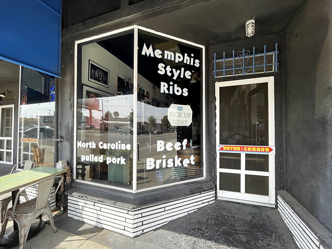 The window proudly announces its regional allegiances: Memphis ribs, Carolina pulled pork, and Texas brisket&mdash;a United Nations of barbecue.
