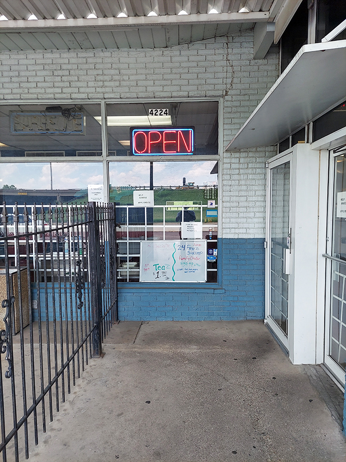The entrance promises no pretension&mdash;just an "OPEN" sign that might as well say "Get in here and eat something amazing."