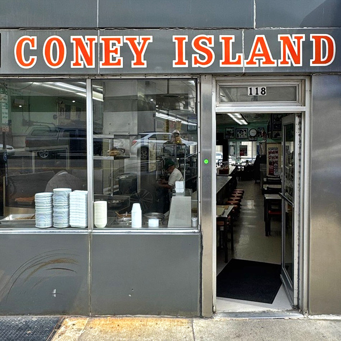 The entrance to hot dog heaven. That simple doorway has welcomed presidents, celebrities, and hungry night shift workers with equal enthusiasm.