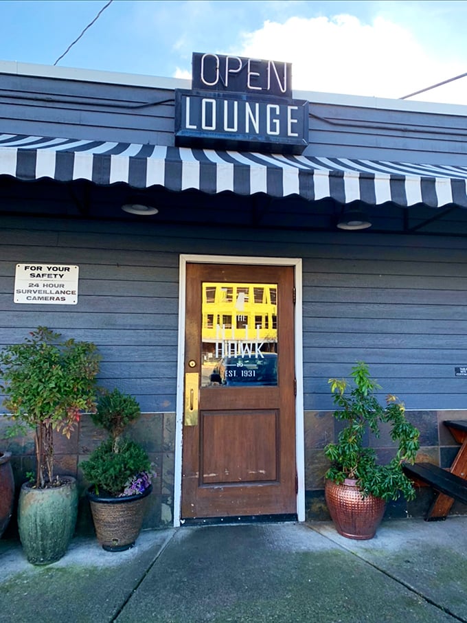 The entrance promises no gimmicks, just good times. Like walking through a portal to a place where the food is honest and the welcome is genuine.