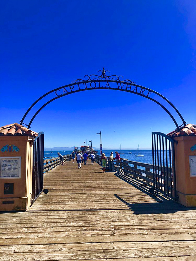 The entrance to Capitola Wharf promises adventure under that impossibly blue California sky. Wood planks never looked so inviting.