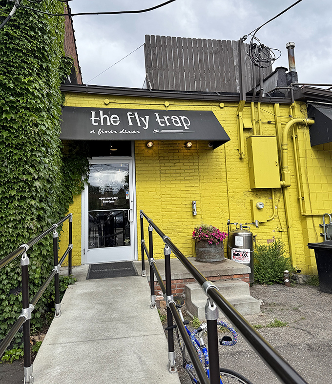 The yellow brick exterior with its accessible entrance doesn't just welcome you&mdash;it practically pulls you in with the promise of culinary delight.